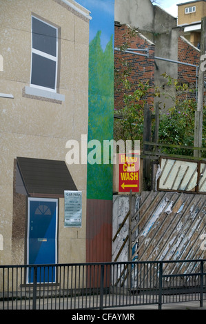 Painted hordings as a tromp-l'oeil covering building works, Edgware ...