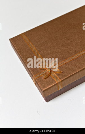 GOLD GIFT BOX WITH RIBON Stock Photo - Alamy