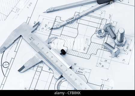 The plan industrial details, a screws, caliper, divider. A photo ...