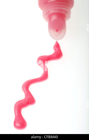 Drizzle of pink lipgloss Stock Photo - Alamy