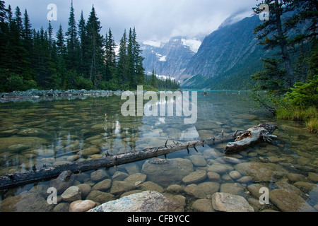 Cavell Lake and Mt. Edith Cavell shrouded in low clouds, Jasper ...
