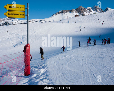 Piste signs at Courchevel, Three Valleys ski resort France on beautiful ...