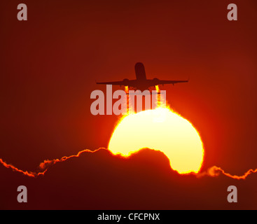 Boeing 737 taking off at sunset Stock Photo - Alamy