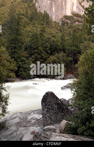 Fast-flowing Merced River, Yosemite National Park, CA. Water cascades ...