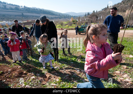 Tu Beshvat Jewish festival. Tree planting event organized by the JNF ...