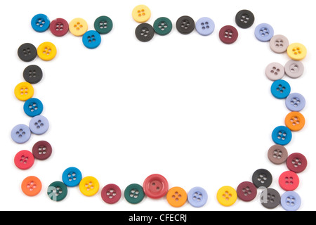 Assorted button bordering white Background Stock Photo - Alamy