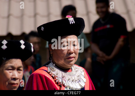 Ethnic Lisu women are attending a traditional dance ceremony in Pai ...