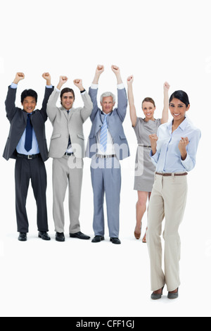 Woman clenching arms in excitement Stock Photo - Alamy