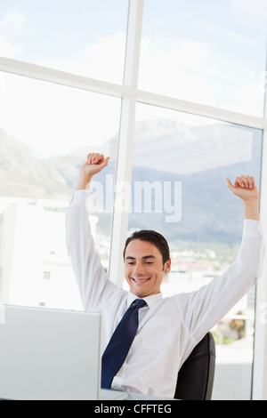 Black man receiving good news notification. African celebrating success ...