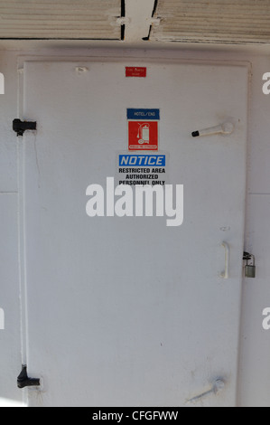 Cruise ship warning sign fire warning safety door Stock Photo - Alamy