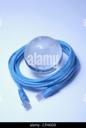 Glass globe surrounded with LAN cable Stock Photo - Alamy