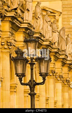 Lamp post and columns at the Louvre Palace, Louvre Museum, Paris ...