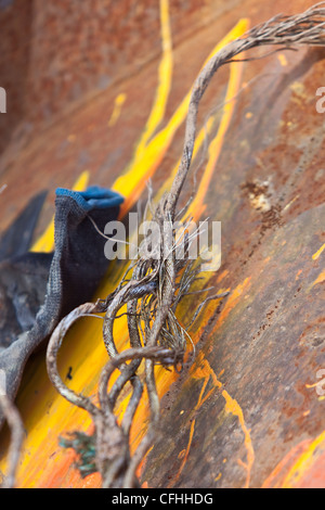 Close up of a corroded or broken wire rope left in waste skips Montrose ...