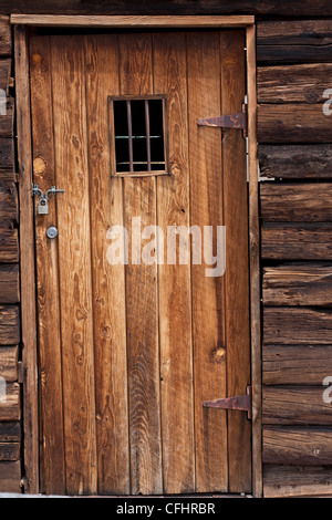 Detail Of A Rustic Jail Door With Bars On The Windows Stock Photo - Alamy