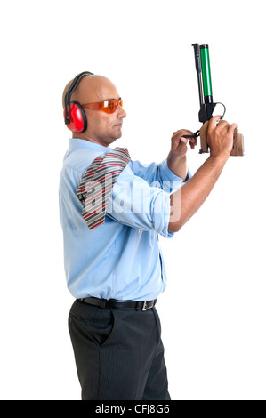 Businessman with compressed air gun shooting at a target Stock Photo ...