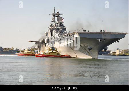 The amphibious assault ship USS WASP (LHD-1) rides at anchor. Base ...