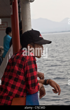 Boat through the strait of Bali, Java, Bali, South Pacific Stock Photo ...
