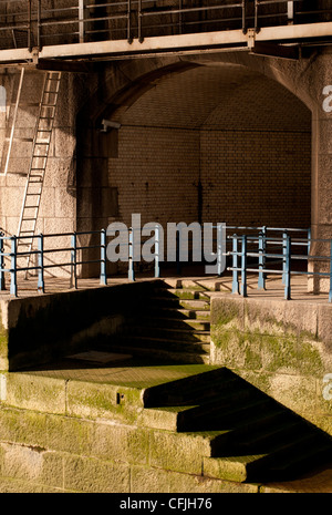 Steps underneath Tower Bridge, London, England, UK Stock Photo - Alamy