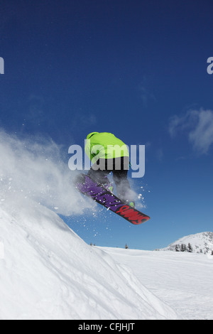 Snowboarder in the air Stock Photo - Alamy