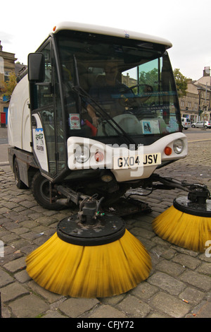 Mechanical road and pavement sweeper at work Stock Photo - Alamy
