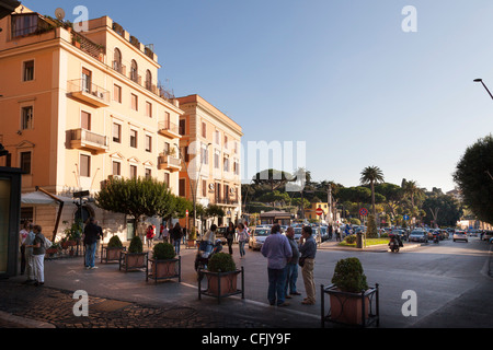 locals relaxing in the evening sunshine at Frascati town centre Stock ...