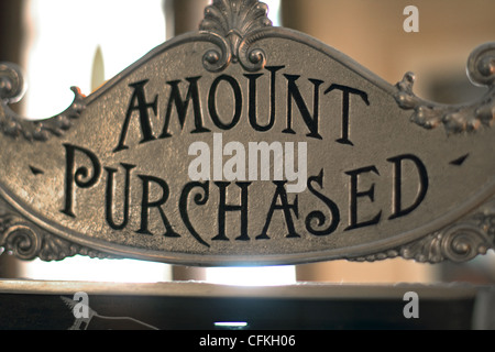 Amount purchased sign on old cash register Stock Photo - Alamy