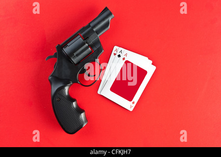 Casino. revolver, cards and counters Stock Photo - Alamy