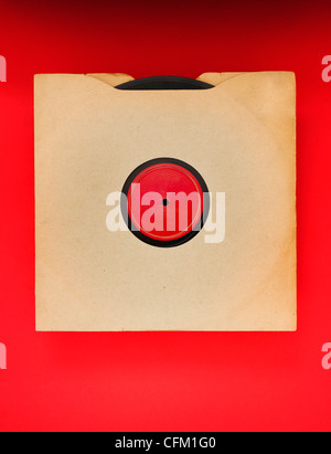 Vinyl record in an envelope on a wooden table Stock Photo - Alamy