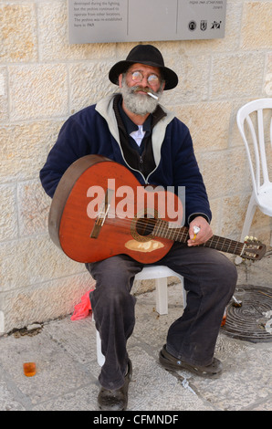 Elderly Jewish man smoking in background with out of focus shalow depth ...
