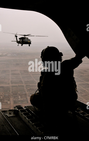 Crew chief 1st Cavalry Division Airmobile, refuels his assigned UH-1D ...