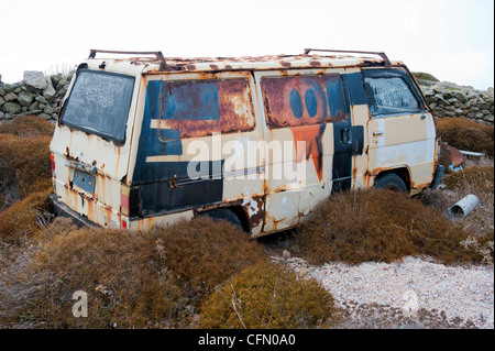Rusty abandoned Mini Car in field Stock Photo - Alamy