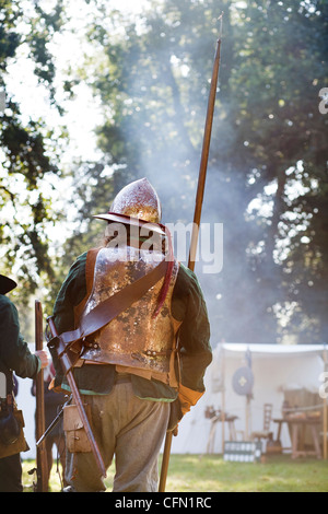 Living history, outdoor re-enactment event. Medieval mature man ...