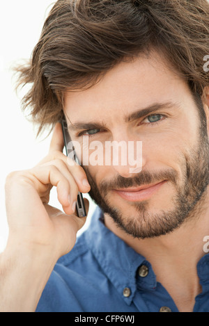 Portrait of man using cell phone Stock Photo - Alamy