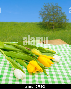Spring easter tulip on blue wooden background Stock Photo - Alamy