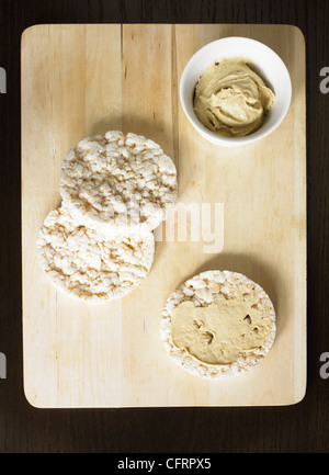 Rice Cake with Hummus Stock Photo - Alamy