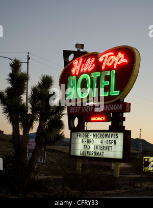 Neon sign of Hill Top Motel glowing in the night with a smaller sign ...