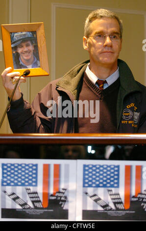 Michael Burke, of the Bronx, holding a picture of his brother, FDNY ...