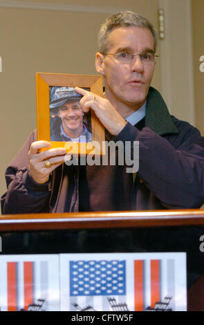 Michael Burke, of the Bronx, holding a picture of his brother, FDNY ...