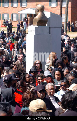People listen as democratic presidential candidate Sen. Bernie Sanders ...