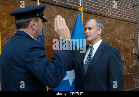 Maj. General Rick Rosborg swears in Dr. Alan Flower. Dr. Alan Flower ...