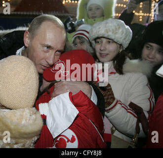 Vladimir Putin with russian kids at the skating rink on the Red Square ...