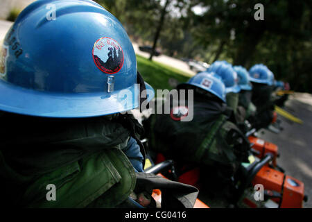 Photo by: Guy Kitchens Del Rosa Hotshot Seth McKinney sleeps on the way ...