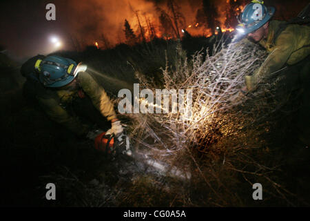 Photo by: Guy Kitchens Del Rosa Hotshot Seth McKinney sleeps on the way ...