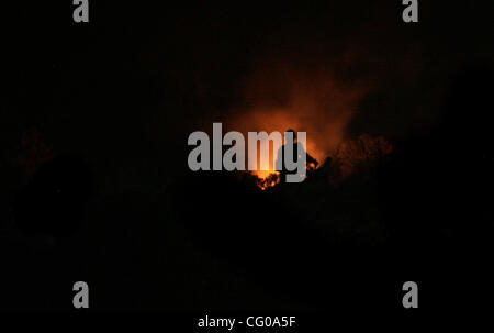 Photo by: Guy Kitchens Del Rosa Hotshots cut line during a fire in Big ...