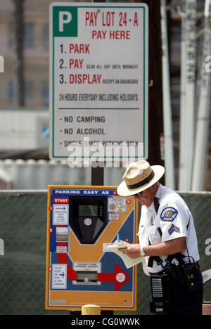 July 16, 2007, Oceanside, California, USA. John Hughlett, a parking ...