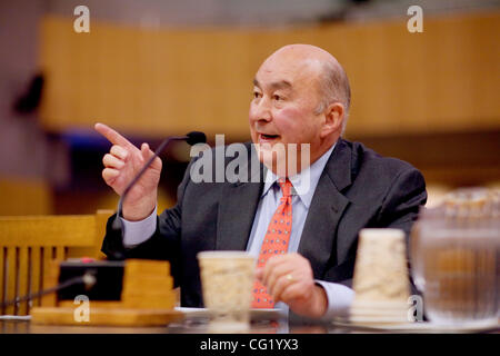 California State University Chancellor Charles Reed, left, shakes hand ...