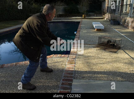 Larry Manger , also known as "Larry the Trapper" has a job of removing ...