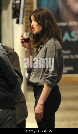 Gemma Arterton shares a rather animated conversation with friends ...