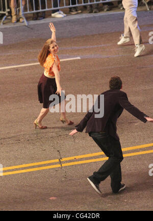 Amy Adams and Jason Segel filming a scene of Disney’s 'The Muppets' on ...