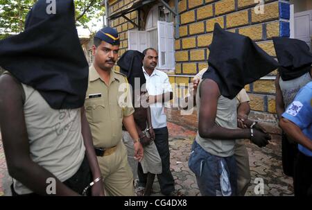 MUMBAI, INDIA - JANUARY 15: Mumbai police personnel helping senier ...